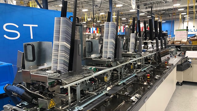 In-line, automated card attaching is opening up lucrative new markets.